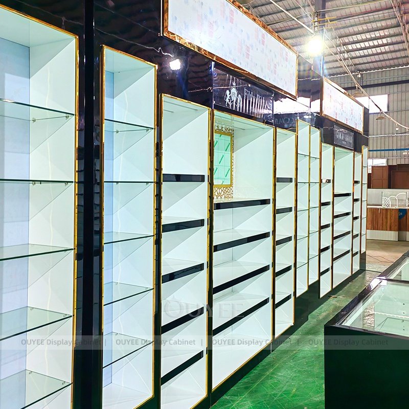 Luxury Perfume Display System | Black & Gold Wall Display for Retail