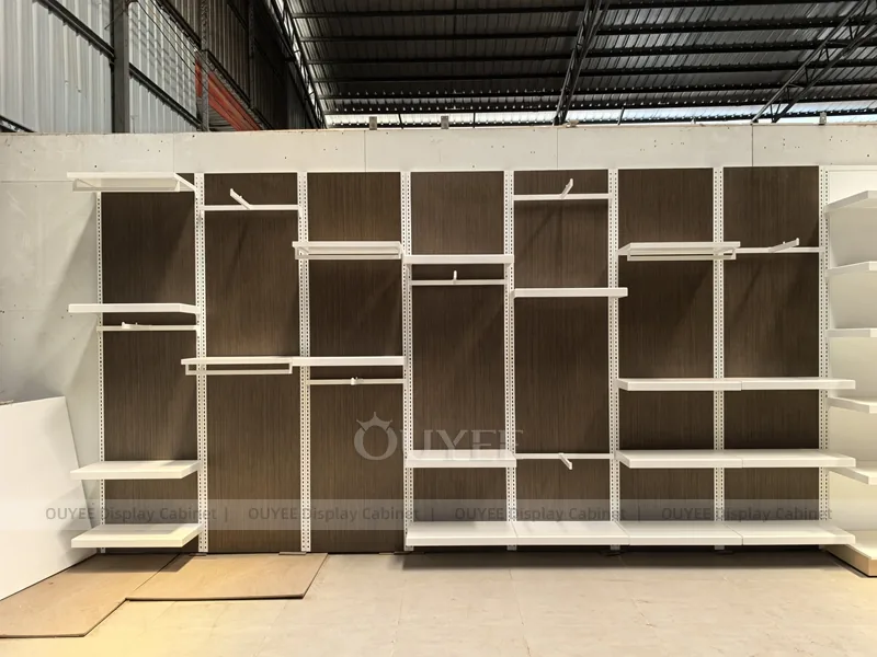 White Modular Shelving and Wardrobe Wall System | Clothing Store